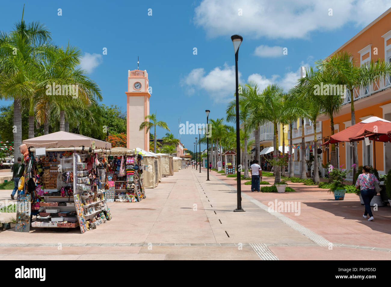 Cozumel main square with souvenir vendor booths, clock tower and ...