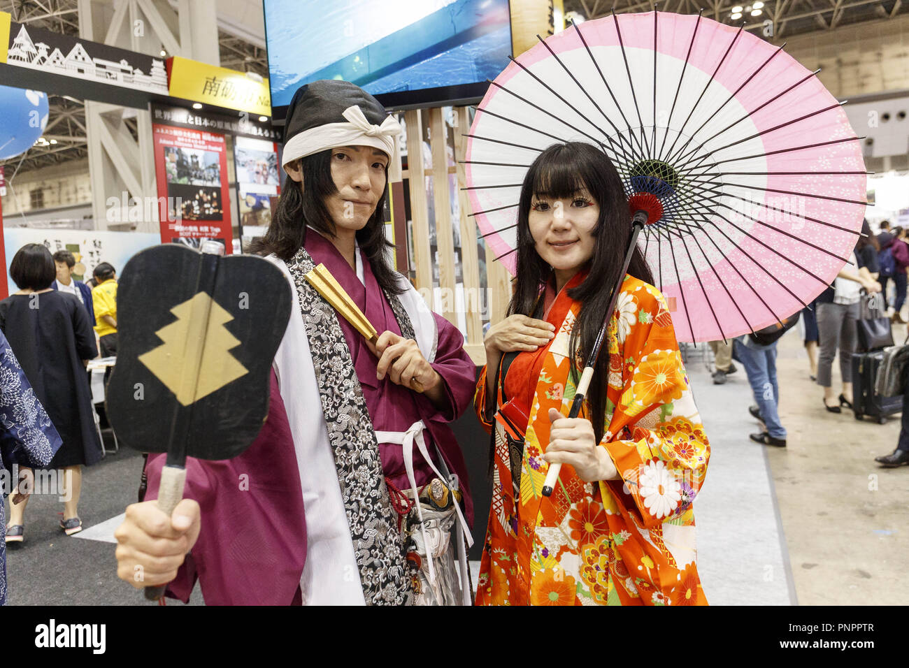 Tokyo, Japan. 22nd Sep, 2018. Booth assistants pose for a photograph ...