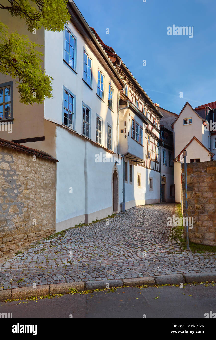 Large three-story white-washed historical timber house in Erfurt city ...