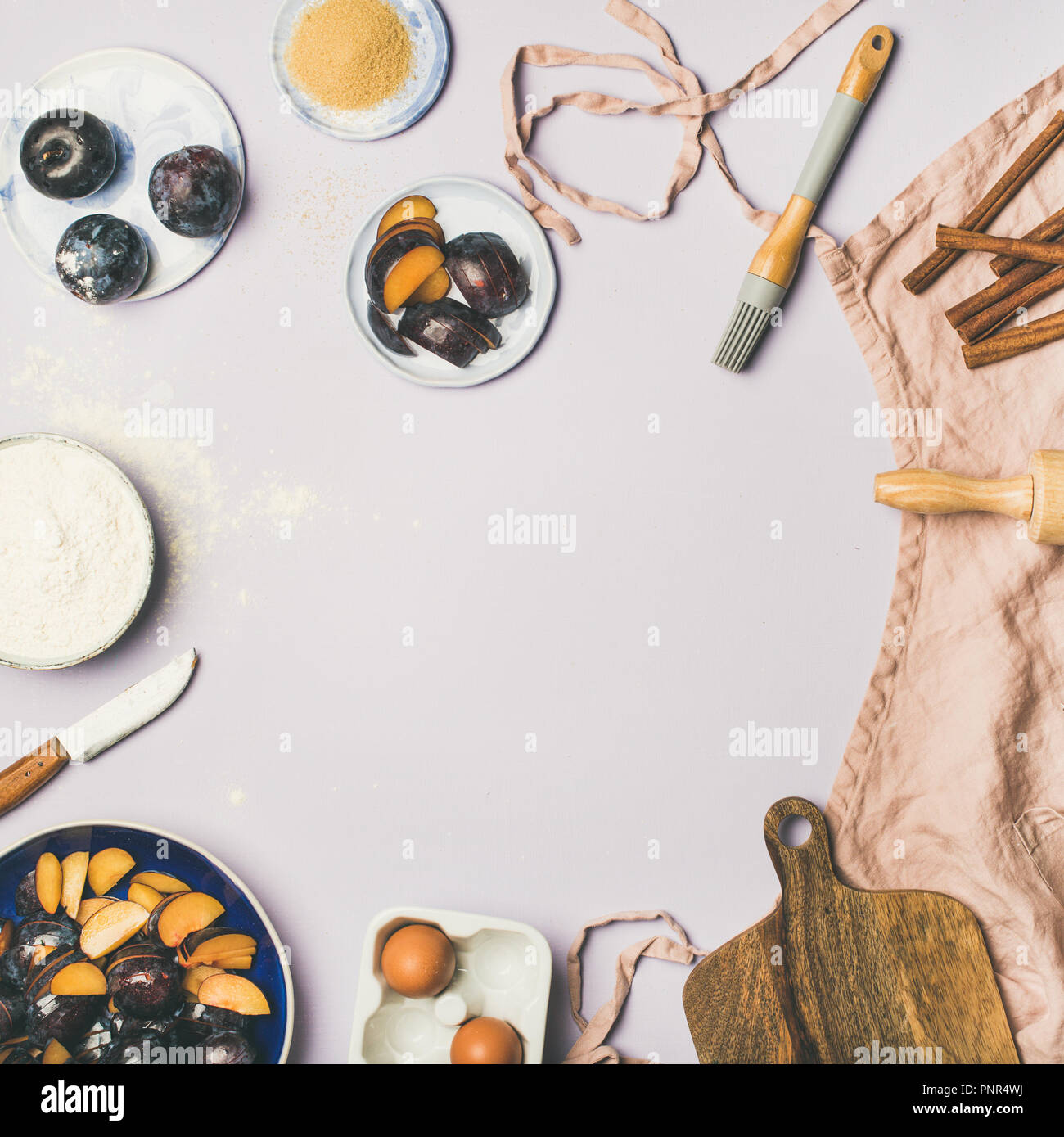 Baking ingredients and tools over pastel background, square crop Stock ...