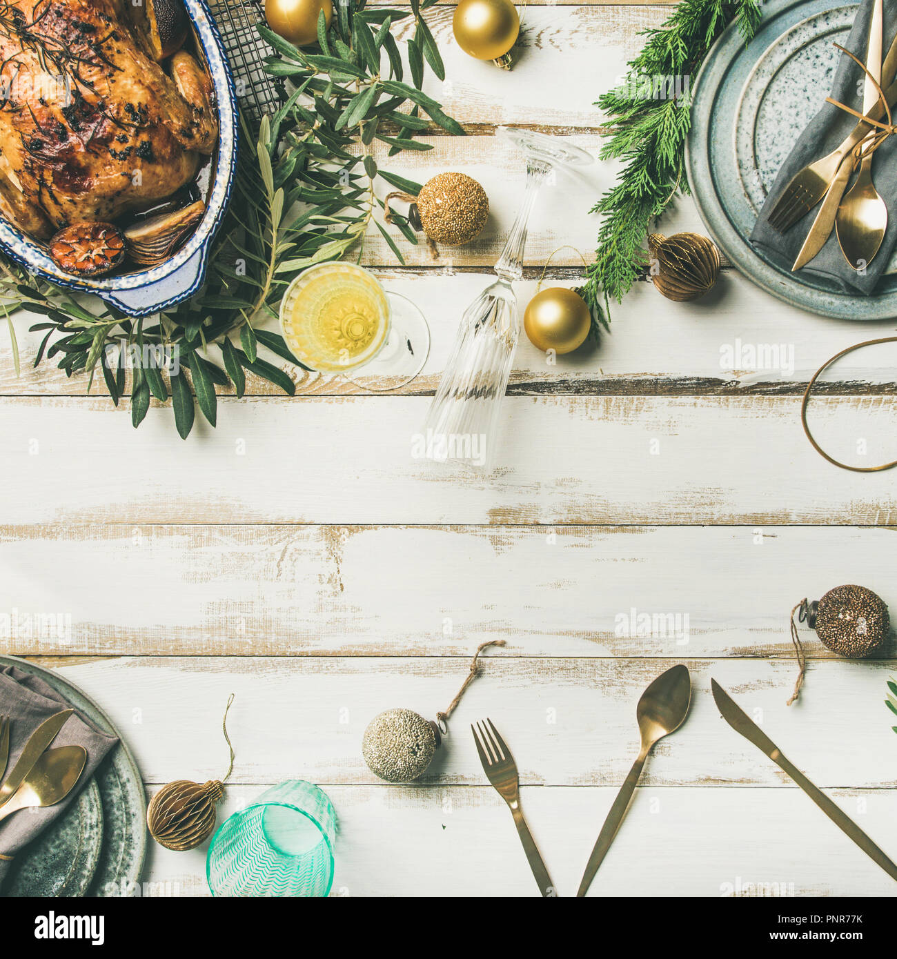 Christmas or New Year celebration table setting with roasted chicken ...