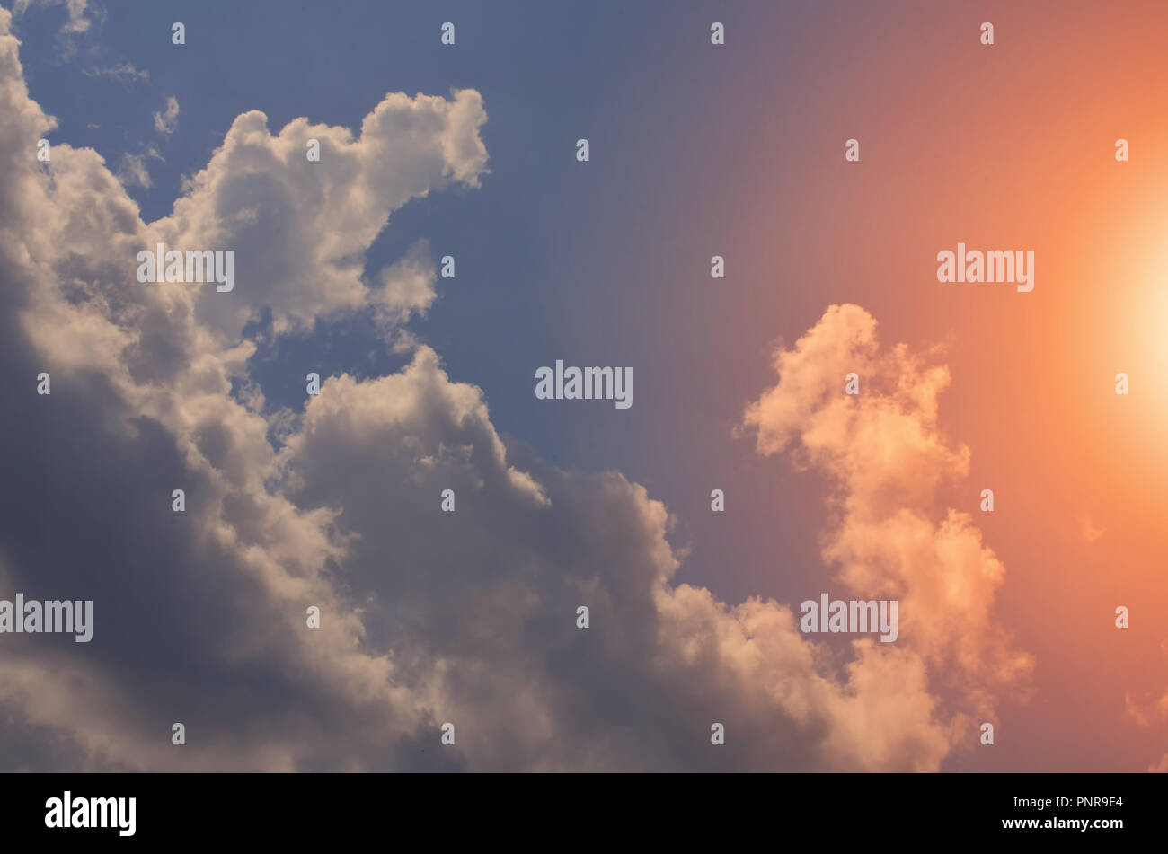 Nature background. Fluffy soft clouds in sky toned Stock Photo - Alamy