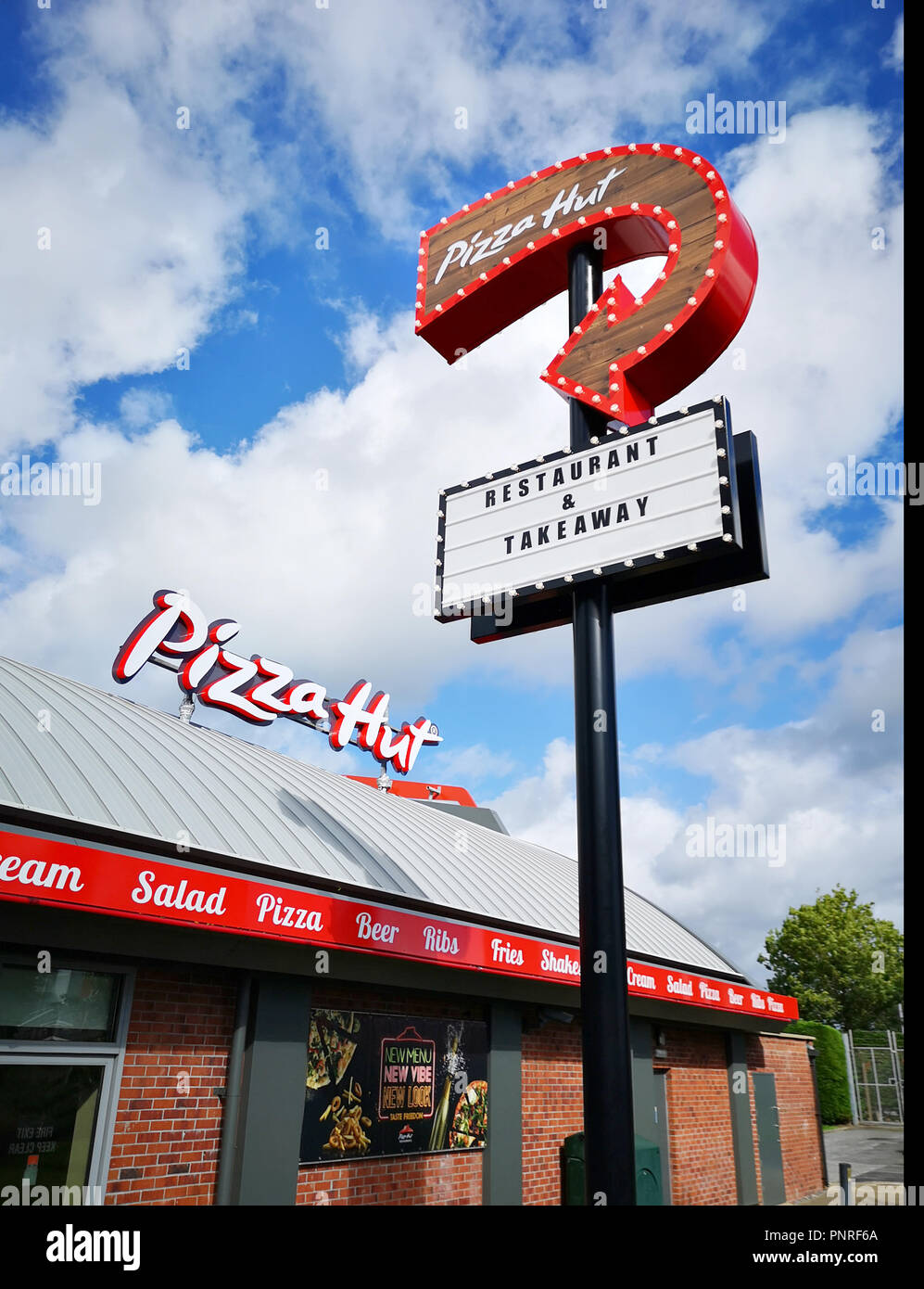 Llanelli, UK: September, 2018: Pizza Hut commercial signage. Pizza Hut ...