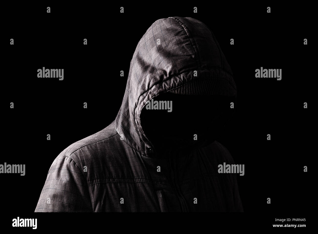 Scary and creepy man hiding in the shadows, with the face and identity ...