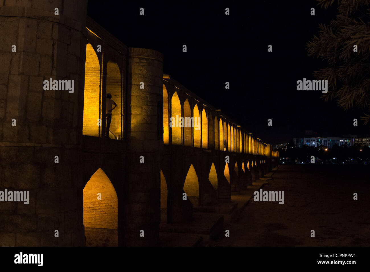 Si o Seh Pol bridge on a dark evening in Isfahan, Iran. Also known as ...