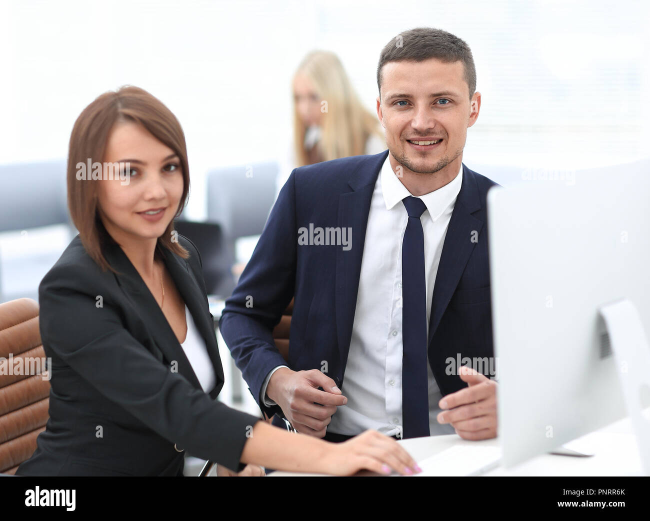 Experienced company employees sitting hi-res stock photography and ...