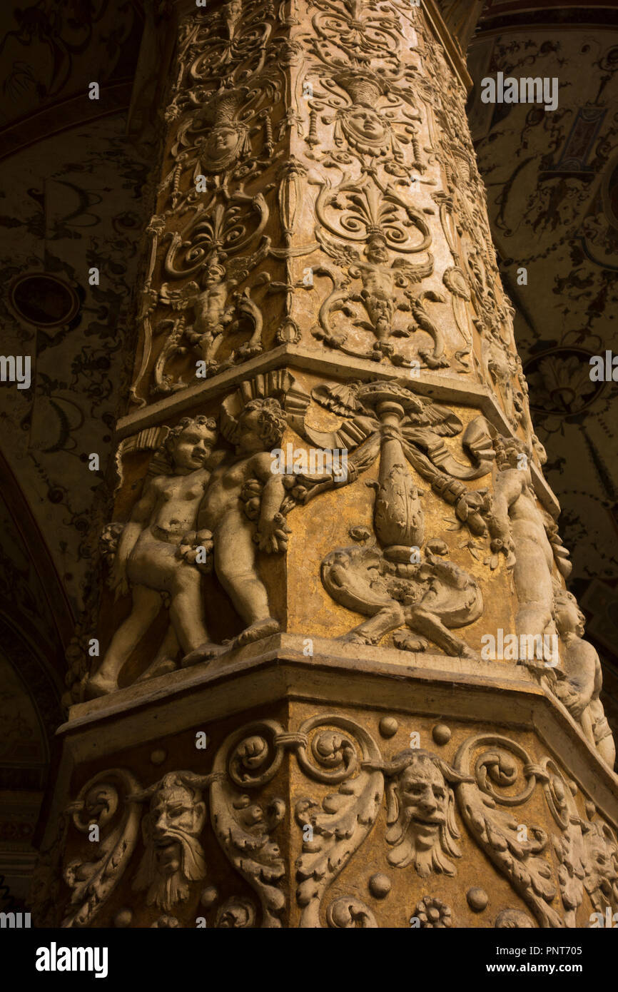 One of the decorated columns of the First Courtyard of the Palazzo ...