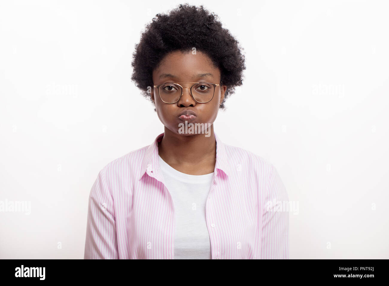 Woman blowing cheeks hi-res stock photography and images - Alamy