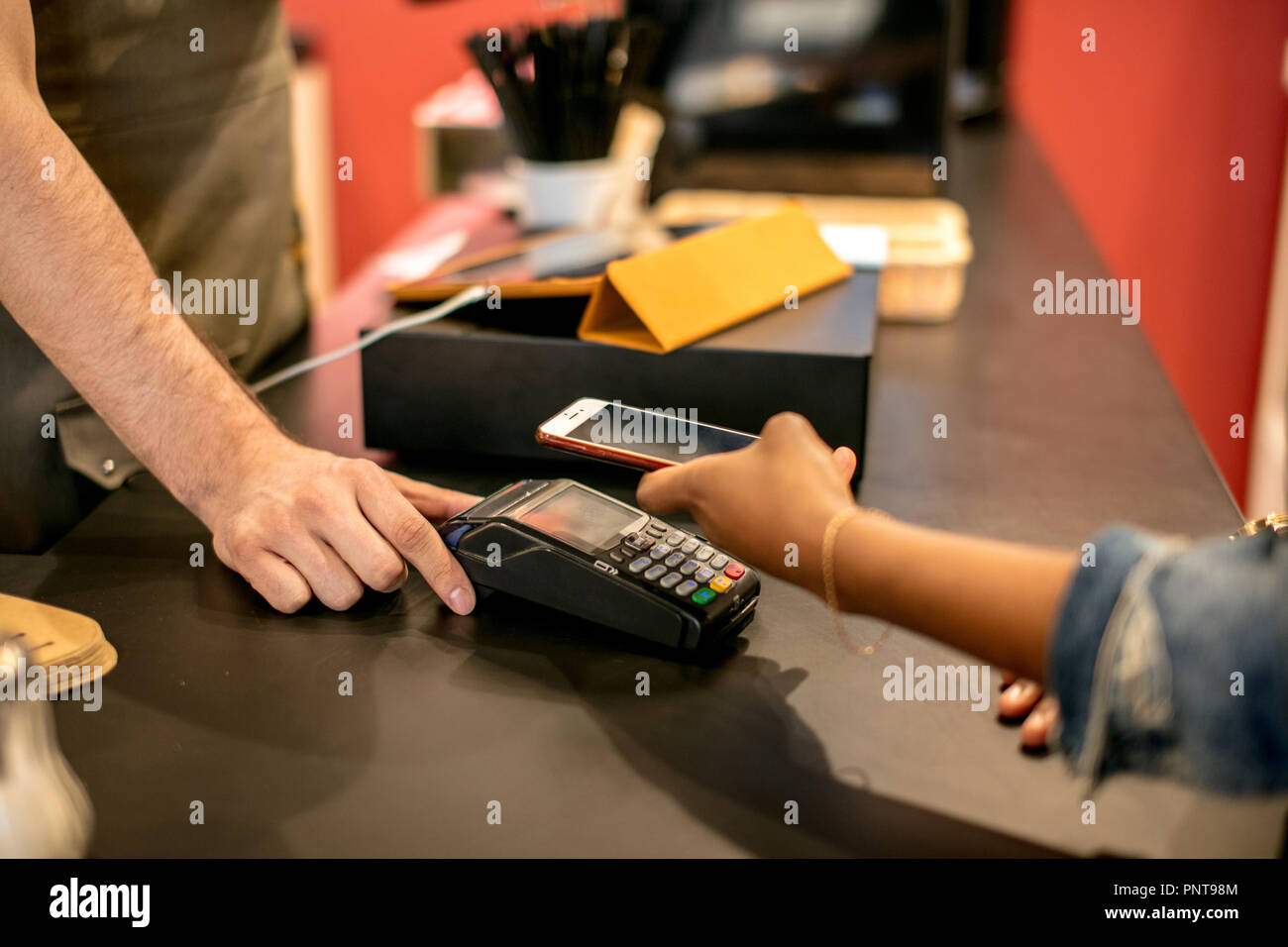 Female pay smart watch hi-res stock photography and images - Alamy