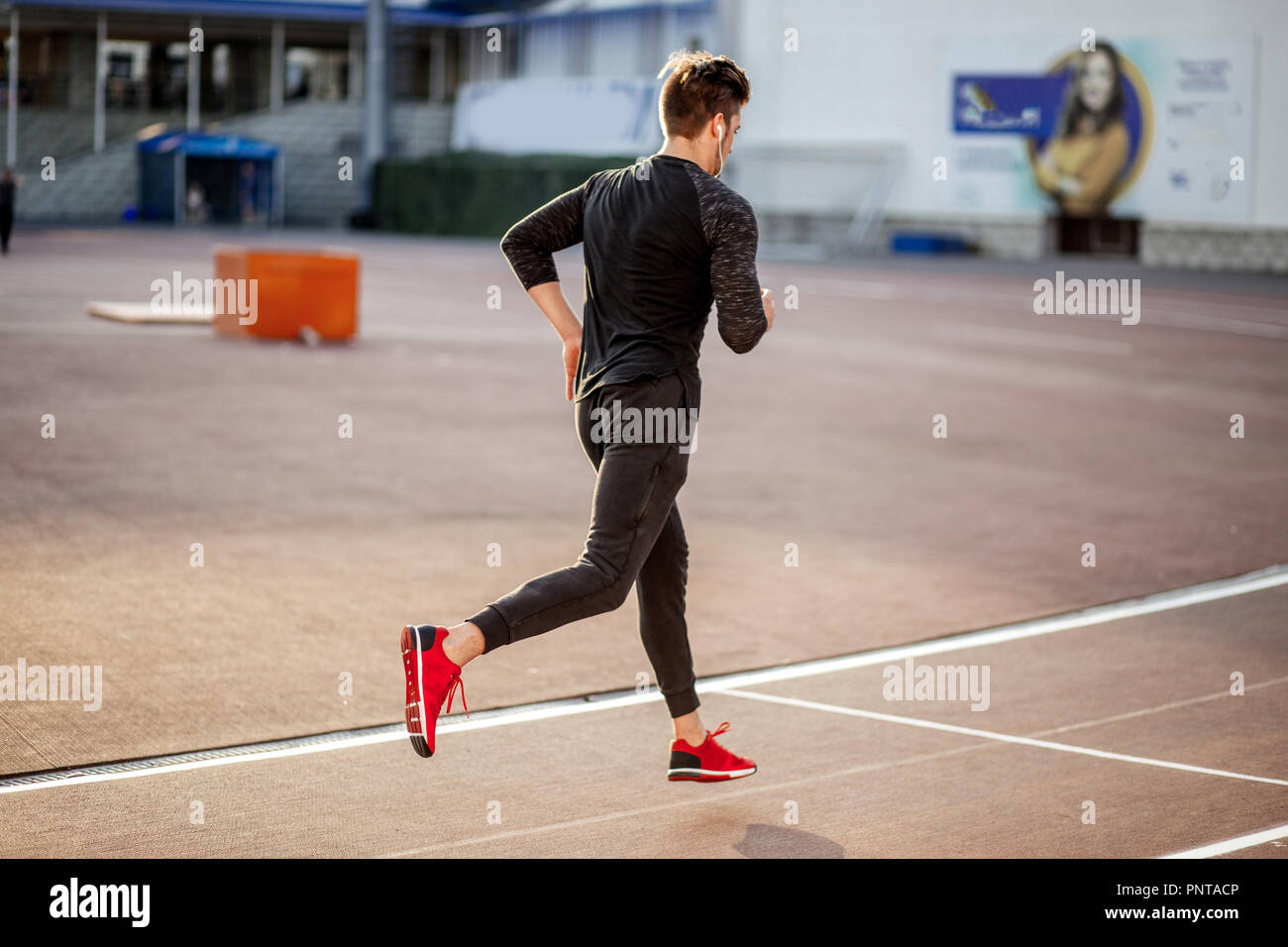Black boy running side view hi-res stock photography and images - Alamy