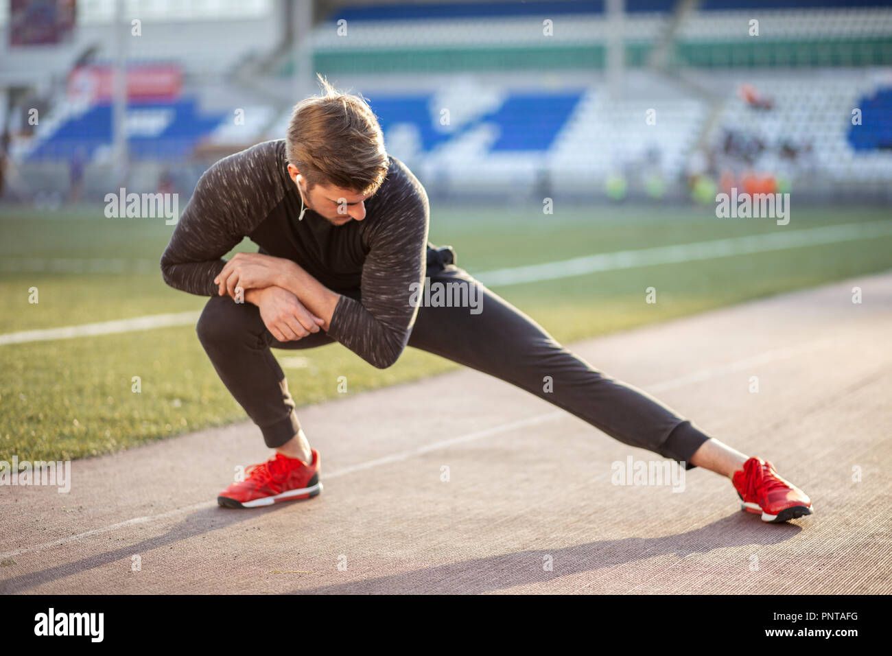 Hamstring stretch man hi-res stock photography and images - Alamy