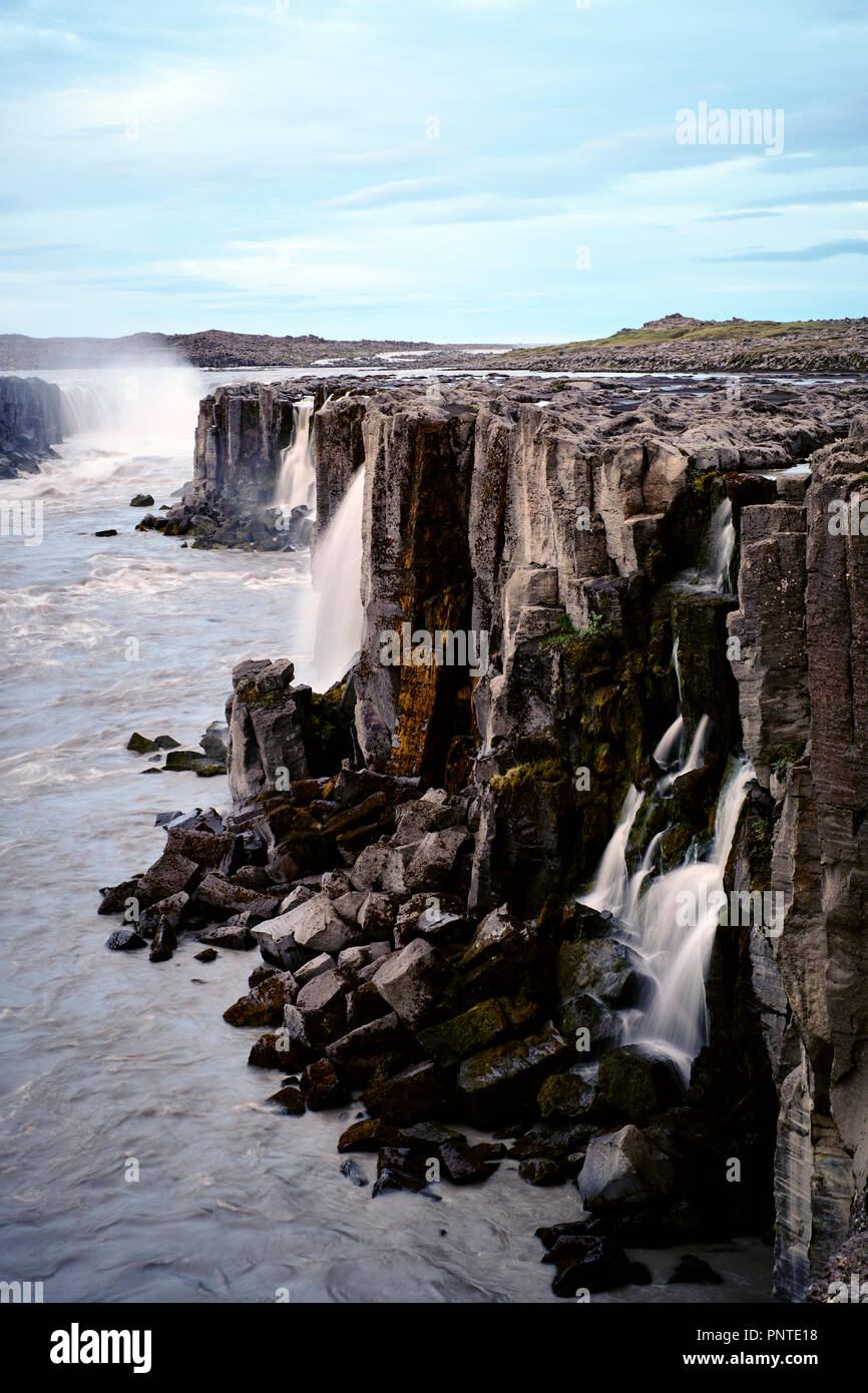 Selfoss waterfall at dusk on the river Jökulsá á Fjöllum in the north ...