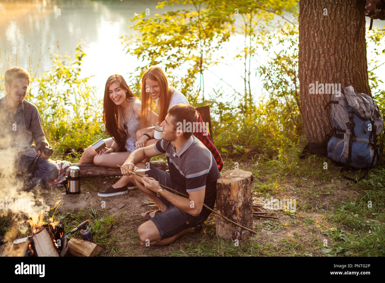 People sitting around bonfire night hi-res stock photography and images ...