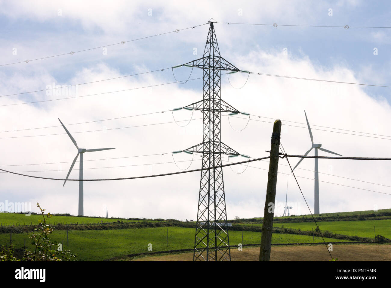 Horizontal view of three different types of energy, old electric post ...