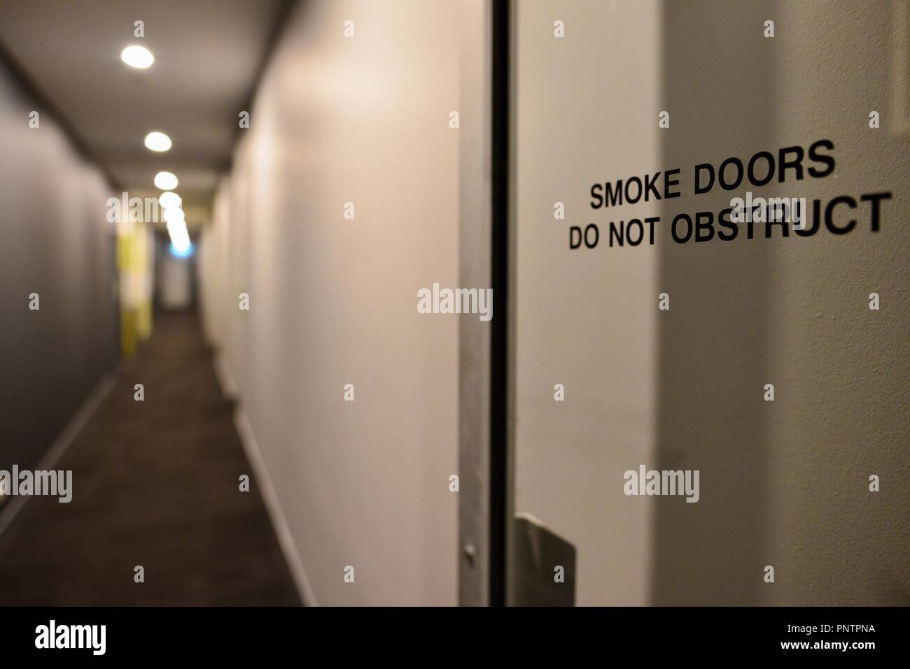 Smoke doors do not obstruct sign on a door, Melbourne VIC, Australia ...