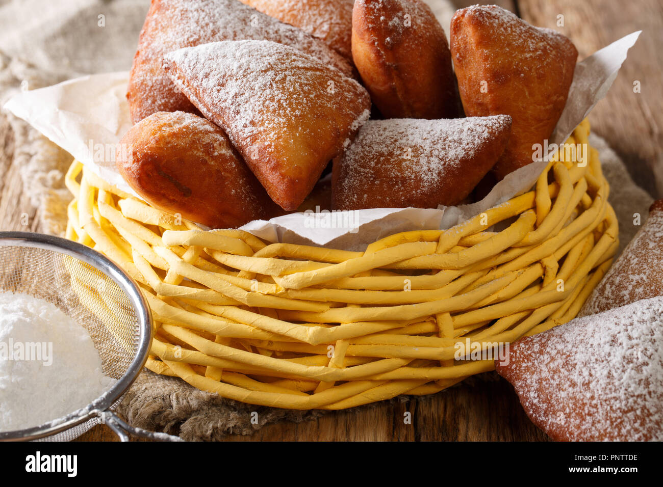 Mandazi or dabo, or South Sudanese Coconut Doughnut close up in the ...