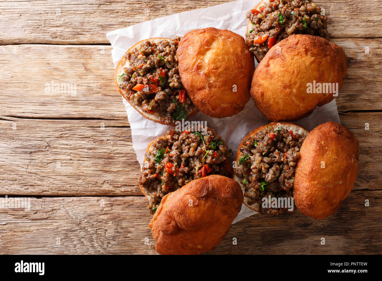 Delicious South African Vetkoek fried donuts stuffed with minced meat ...