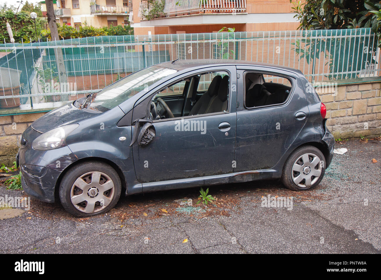 Rome, Italy - November 12, 2014: Broken car on the street of Rome Stock ...