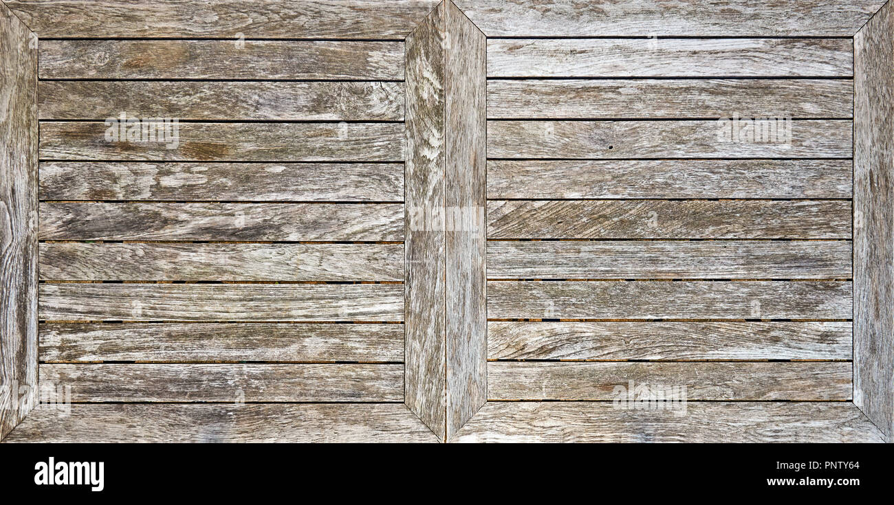 Two textured wooden garden table view from above Stock Photo - Alamy