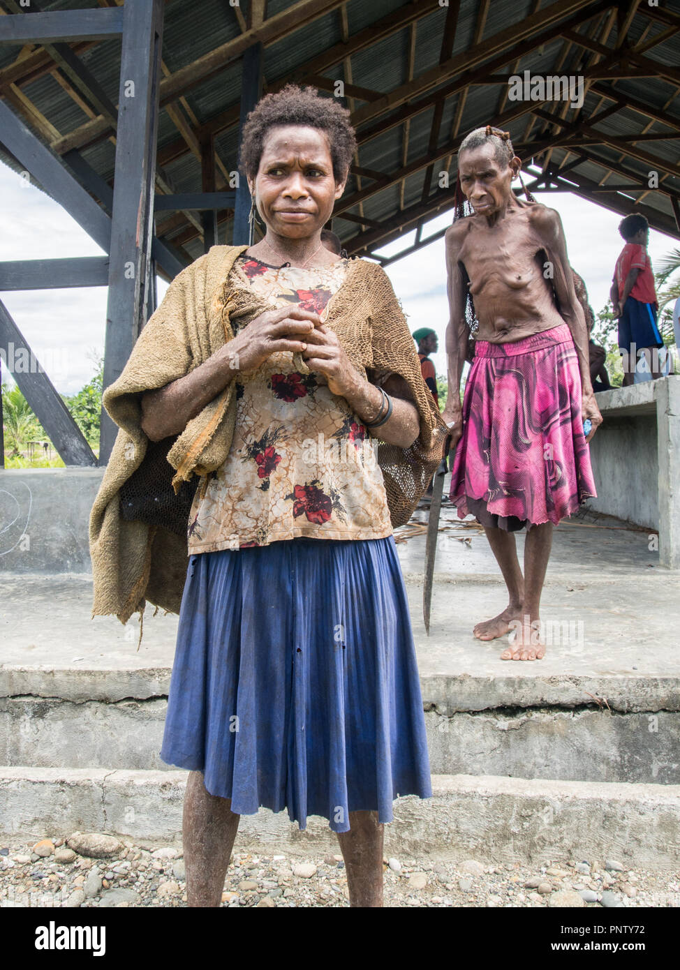 Dekai, Indonesia - January 21, 2015: Two woman, mather and doughter ...