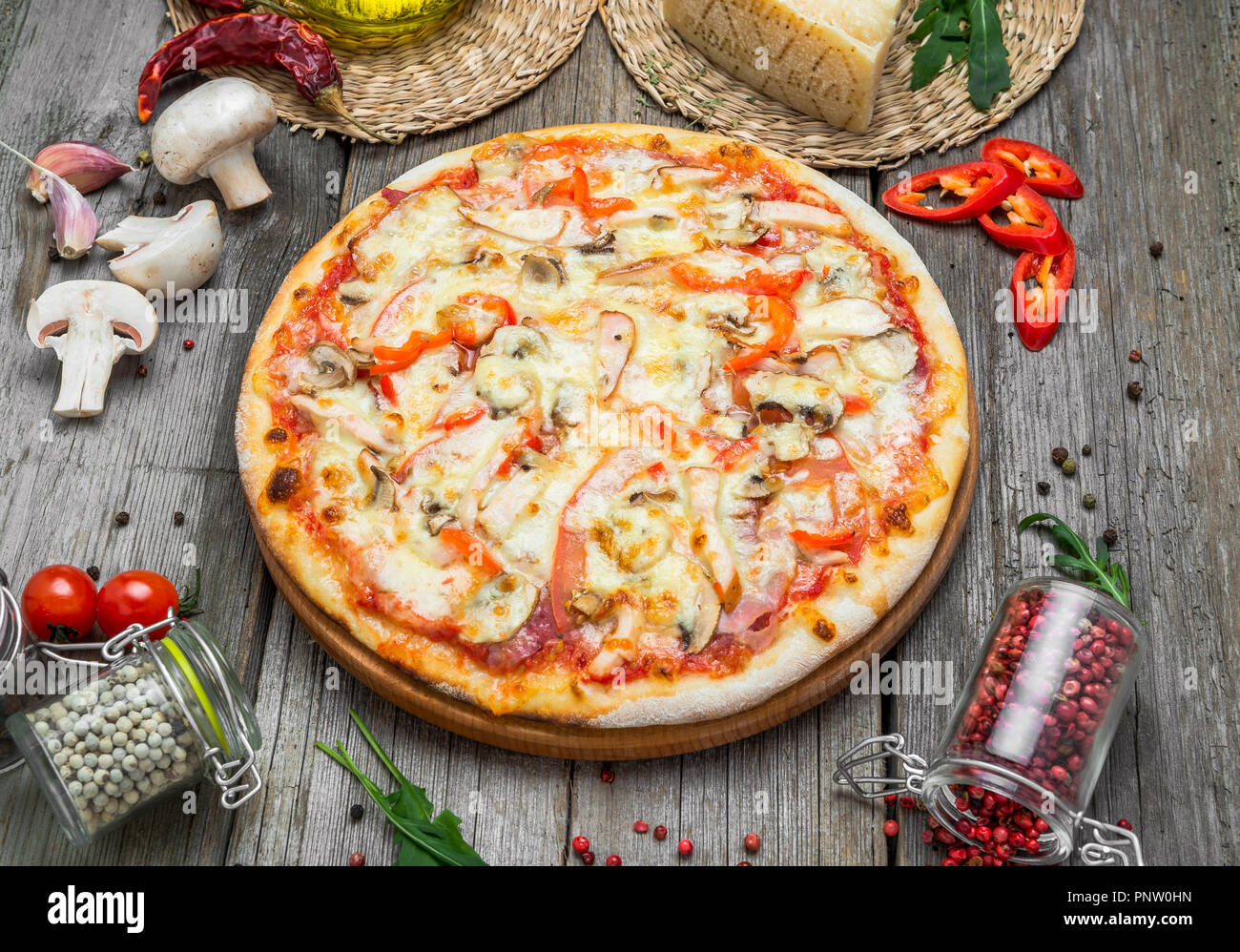 Pizza with tomatoes, mozzarella cheese. Delicious italian pizza Stock ...
