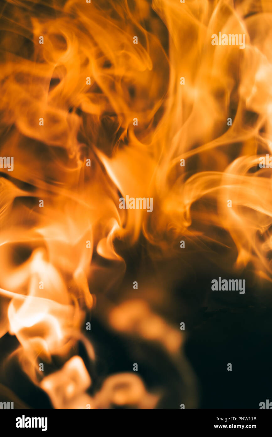 Shot of fire flames and glowing ashes on black background Stock Photo ...