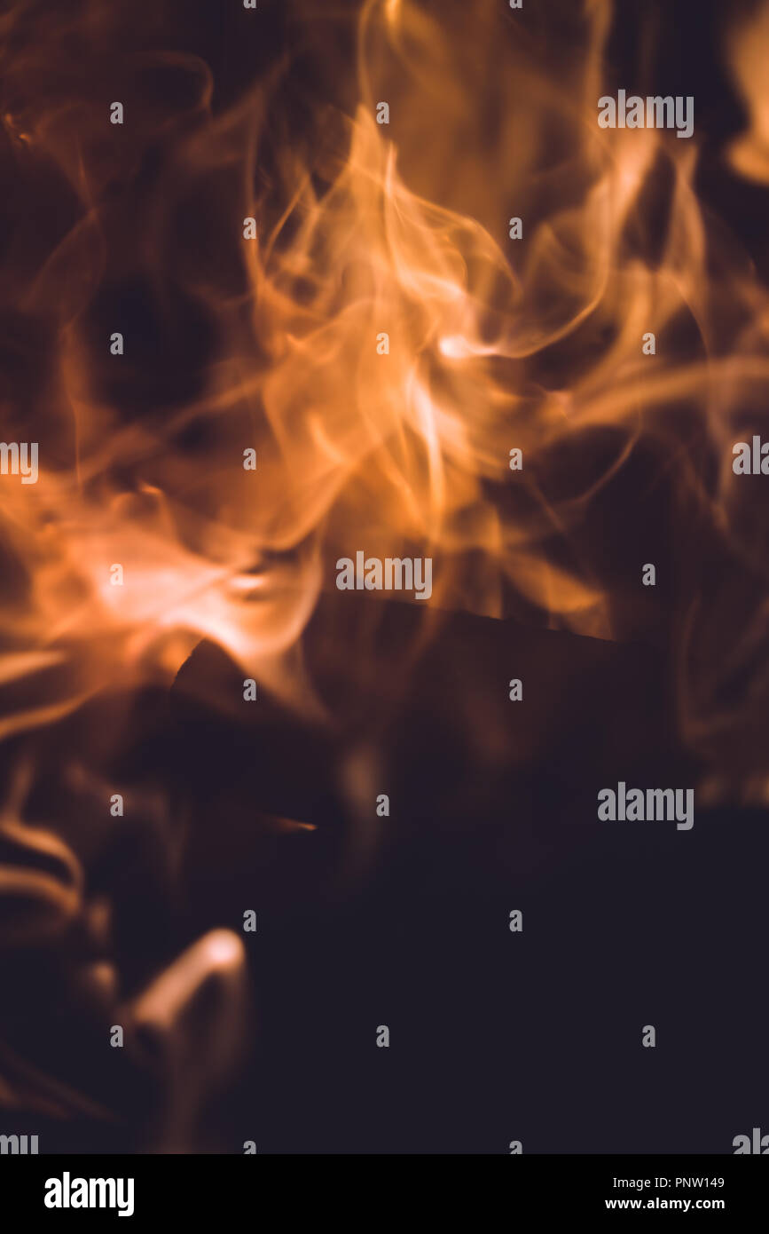 Shot of fire flames and glowing ashes on black background Stock Photo ...