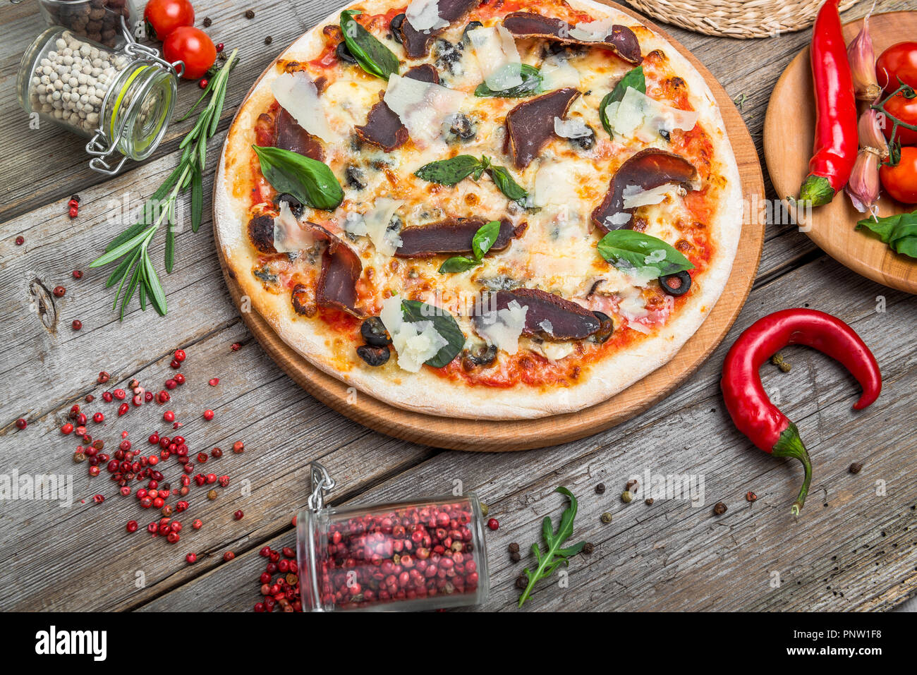 Pizza with tomatoes, mozzarella cheese. Delicious italian pizza Stock ...