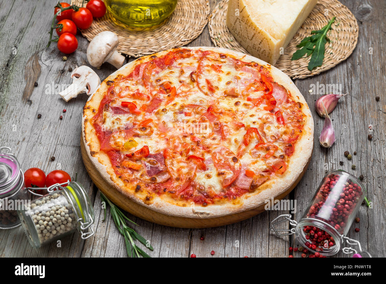 Pizza with tomatoes, mozzarella cheese. Delicious italian pizza Stock ...