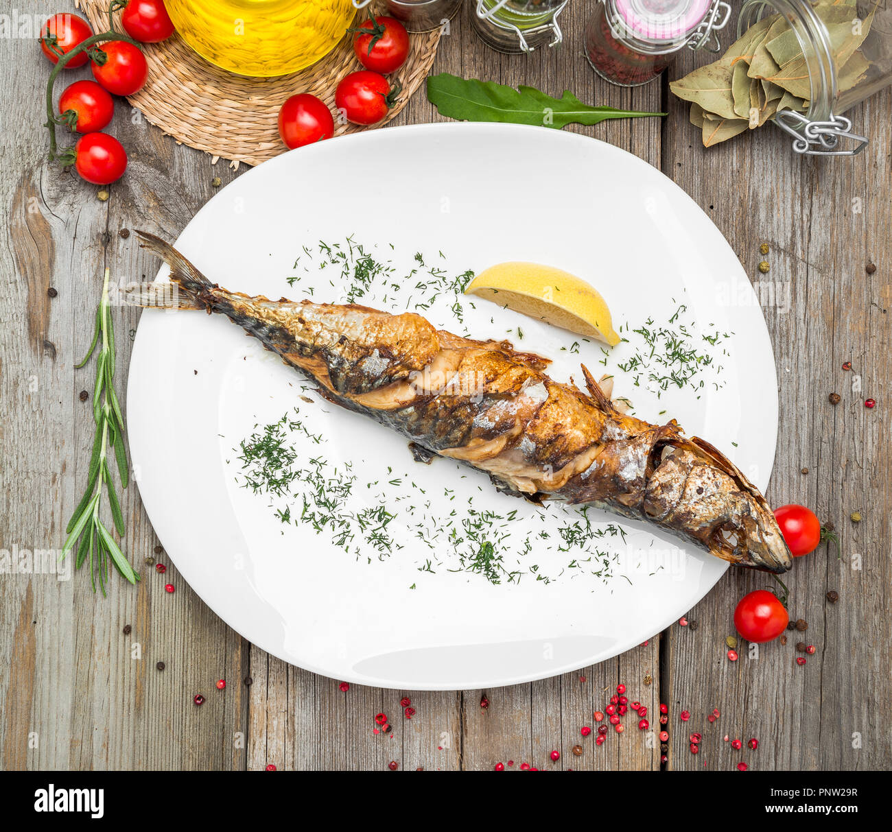 Oktoberfest menu. Grilled mackerel fish with beer and pretzel served ...