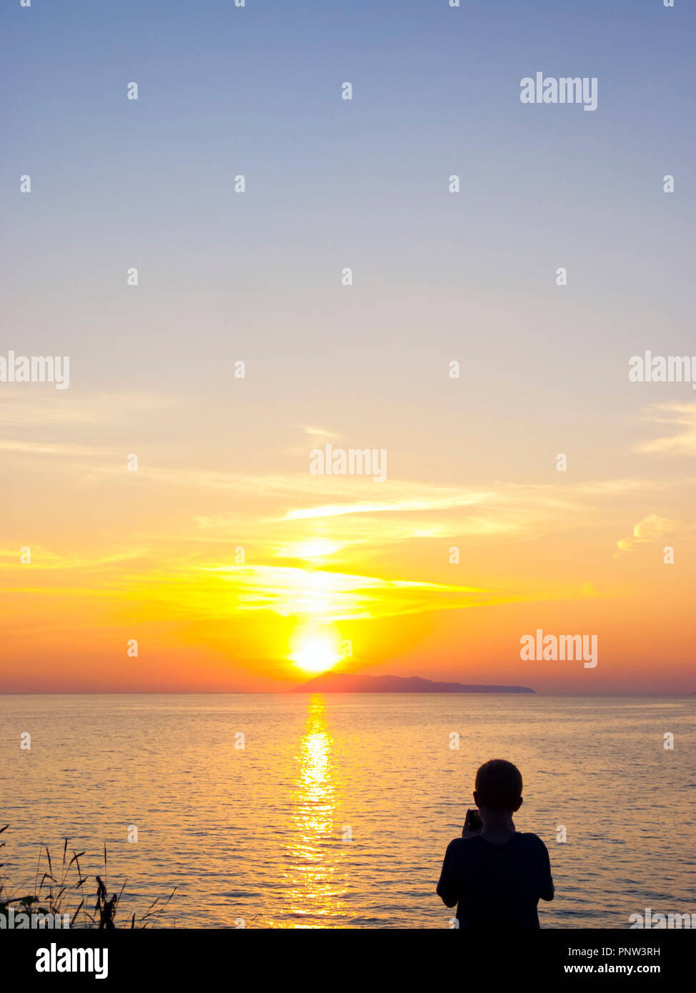 Corfu island, Greece - August 22 2018: Beautiful sunset at Logas beach ...