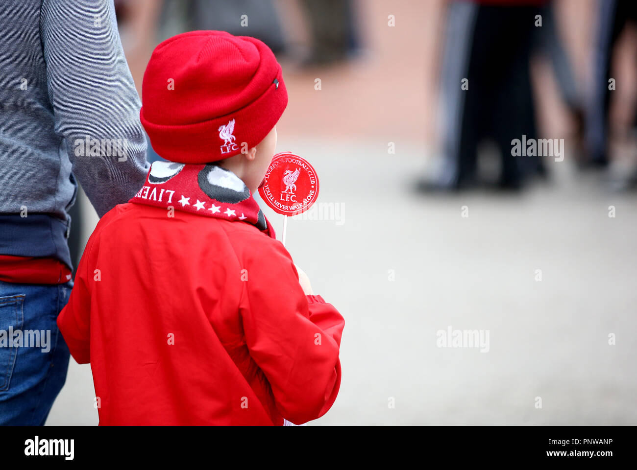 A young Liverpool fan with a Liverpool lollipopduring the Premier ...