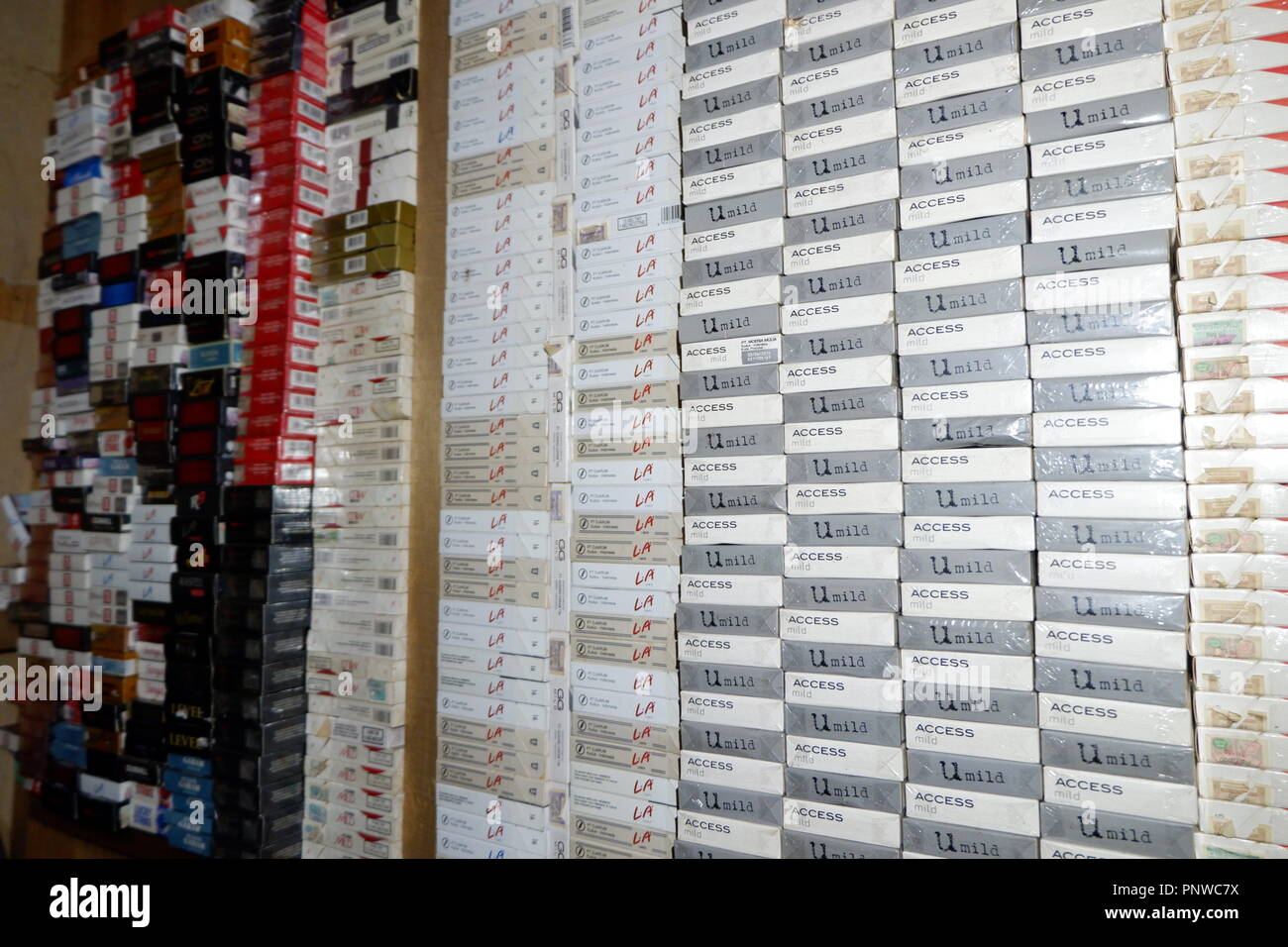 Many packs of different indonesian cigarettes photographed Stock Photo ...