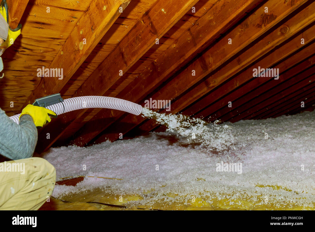 Installing insulation in attic hi-res stock photography and images - Alamy