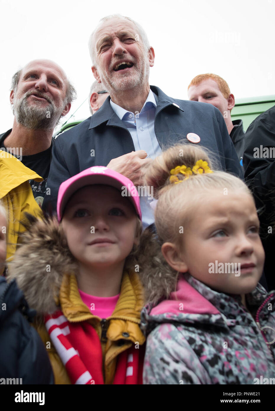 Labour leader Jeremy Corbyn poses with local children after making a ...