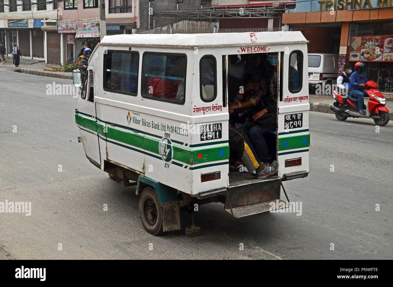 Three wheel taxi hi-res stock photography and images - Alamy