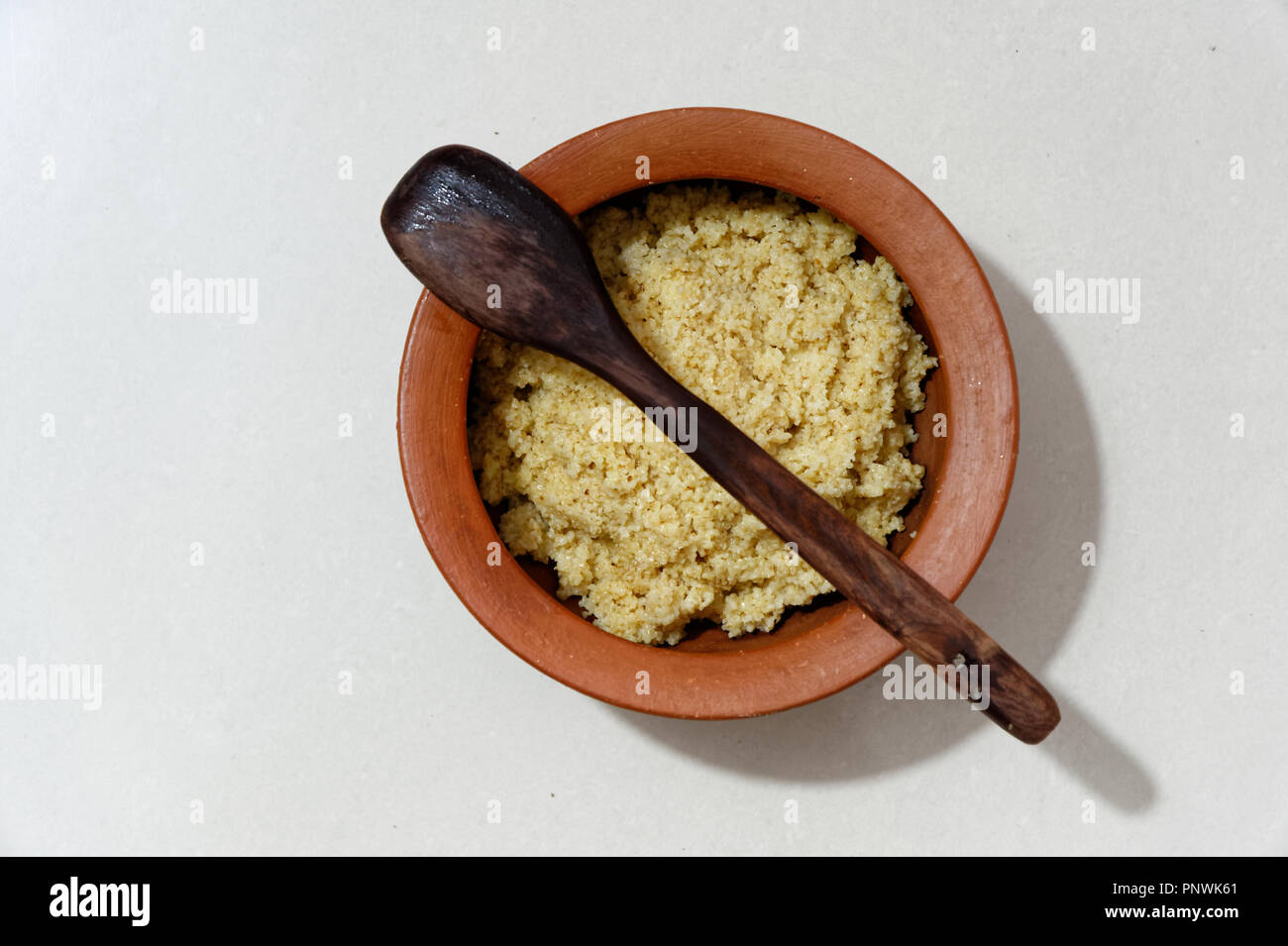 Porridge in an earthenware pot. Traditional, wholesome food , cooked ...