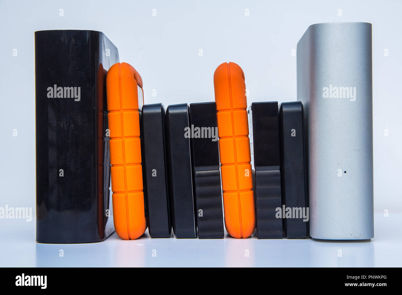 different kinds of external computer storage hard drives - isolated on ...