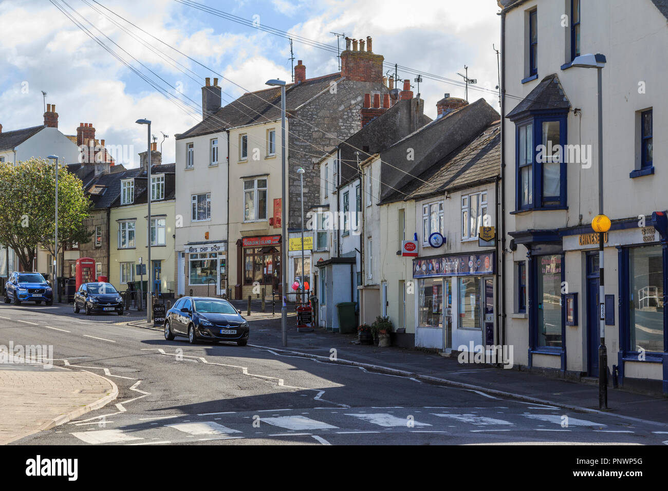 Isle of Portland village of easton high street, gardens, memorial clock ...