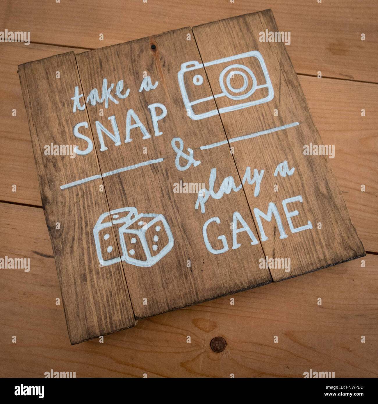 Take a snap, play a game sign Stock Photo - Alamy