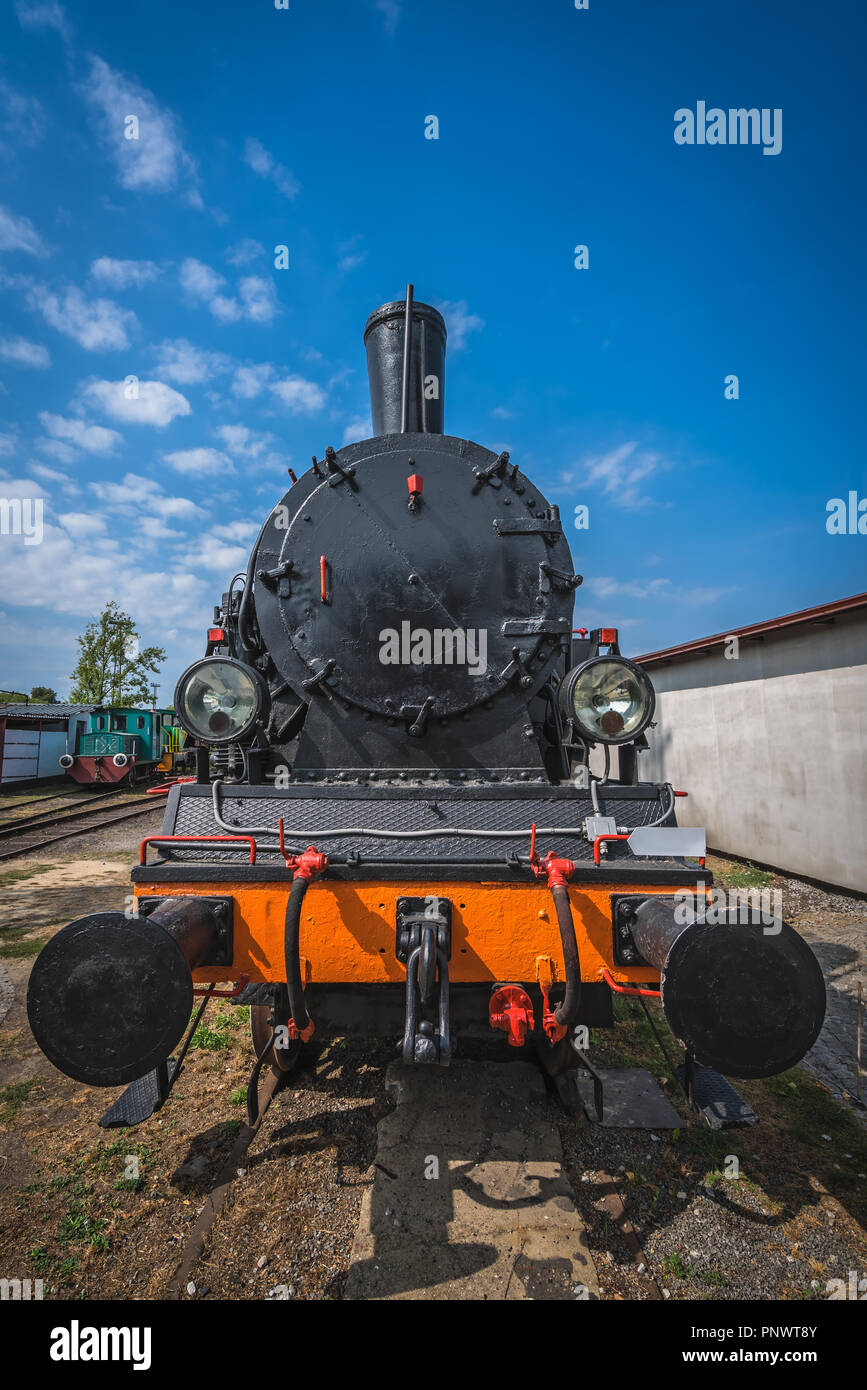An old disused retro steam train locomotive on the side track Stock ...
