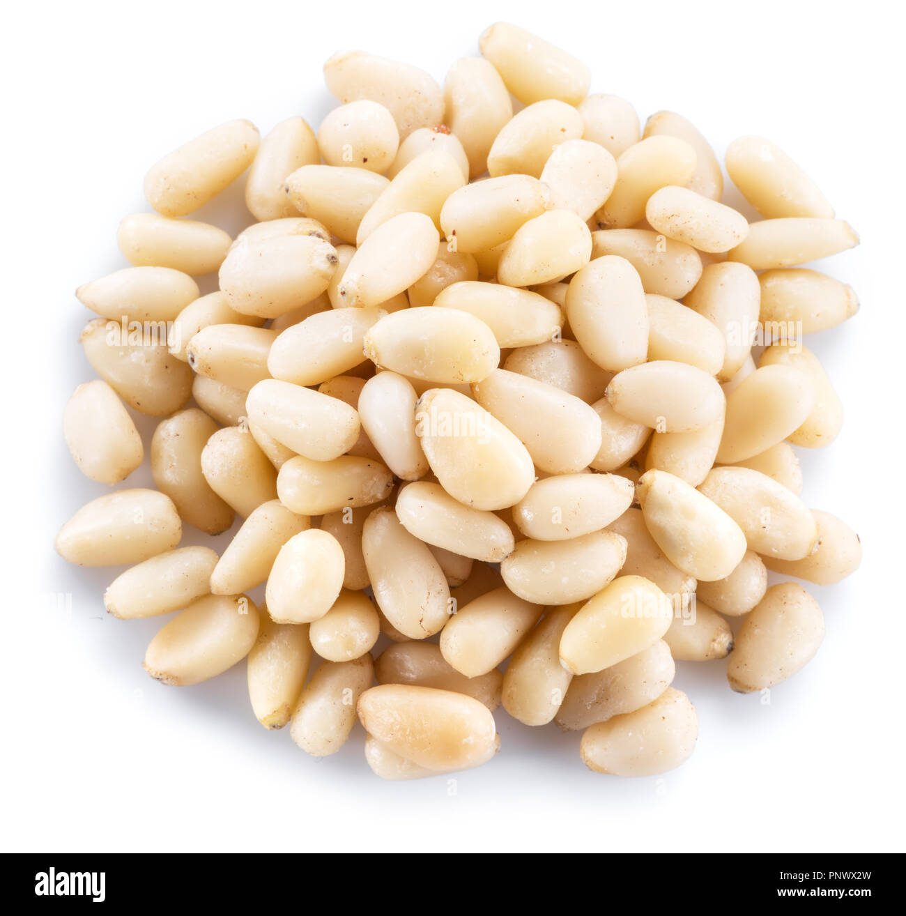 Pine nuts on the white background. Organic food Stock Photo - Alamy
