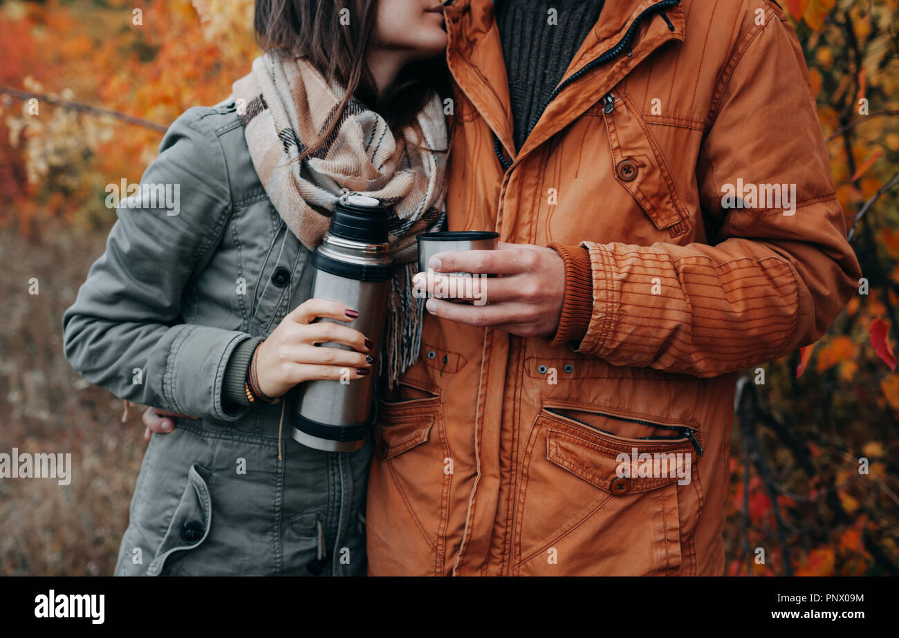 Couple hug drinks hi-res stock photography and images - Alamy