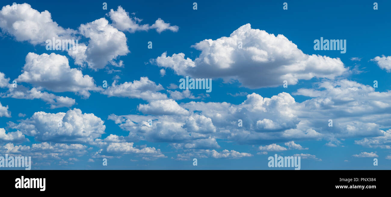 Romantic panoramic cloudscape with azure blue heaven. Idyllic sunlit ...