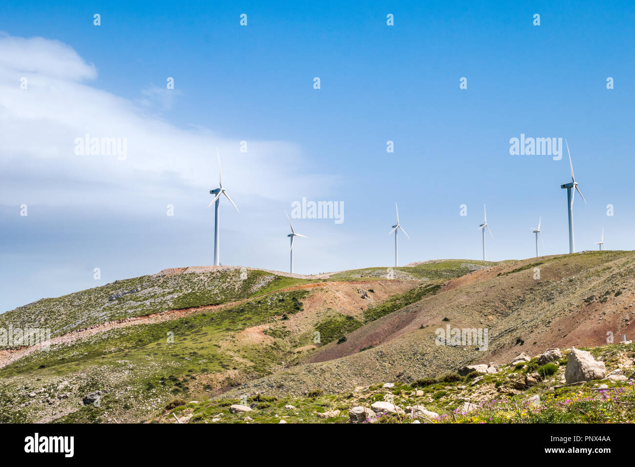 Wind generators on the peak of a mountain Stock Photo - Alamy