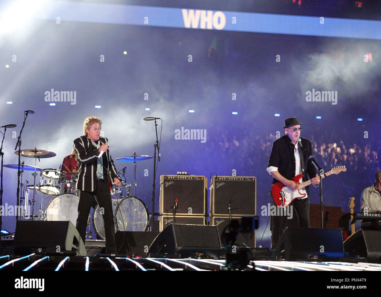 The Who performs during halftime at Super Bowl XLIV between the ...