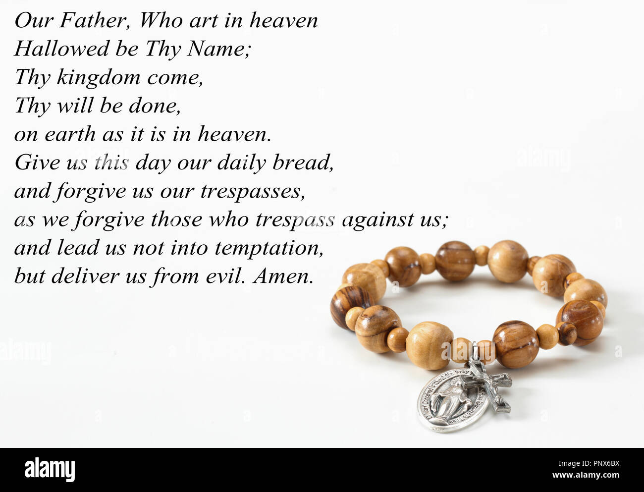 Rosary bracelet on white with Our Father prayer Stock Photo - Alamy