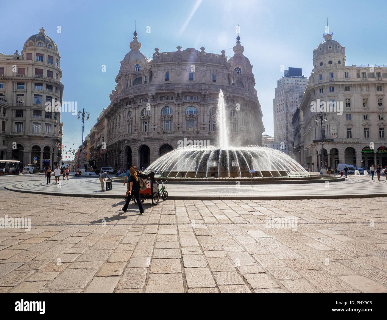 Genoa, historical center with the famous fountain in De Ferrari square ...