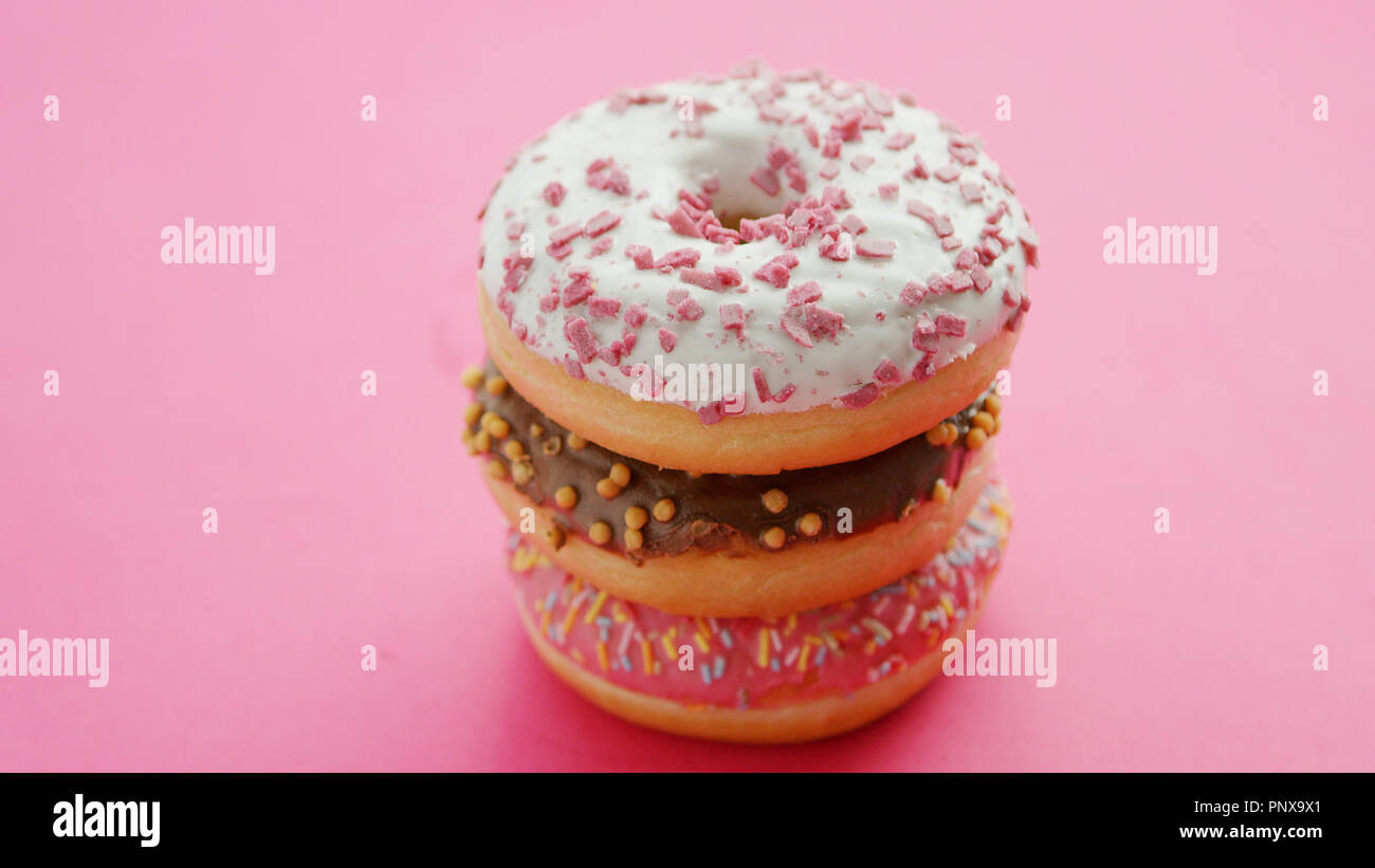 Stack of glazed sweet doughnuts Stock Photo - Alamy
