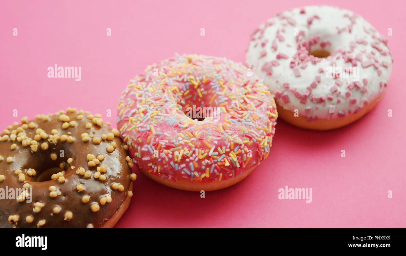 Row of sweet round doughnuts Stock Photo - Alamy